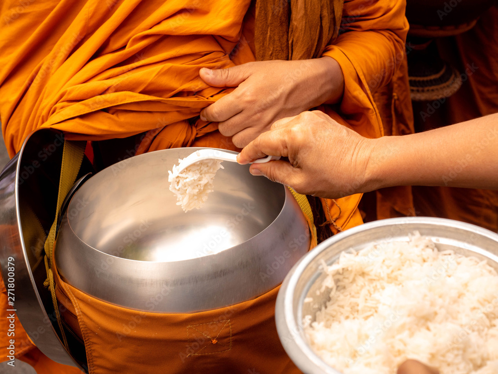 The monks of the Buddhist Sangha (give alms to a Buddhist monk), which ...