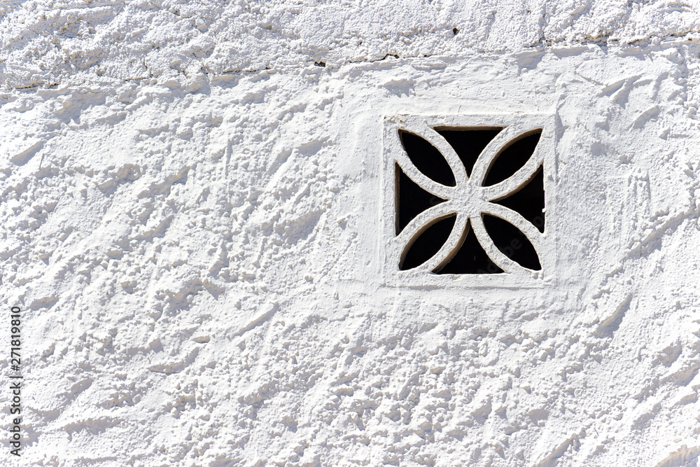 Beautiful ventilation grid of a whitewashed building at Torre de ...