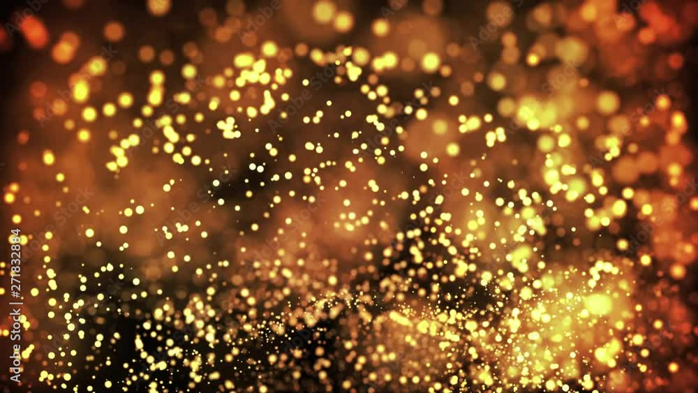 gold particles in liquid float and glisten. Background with glittering ...