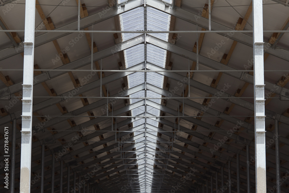 The metal frame of the building on a reinforced concrete base. The use ...