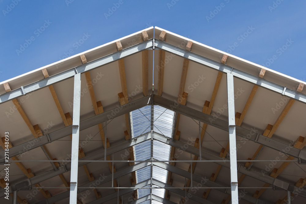 Wooden beams on steel structure for further construction. Metal frame ...