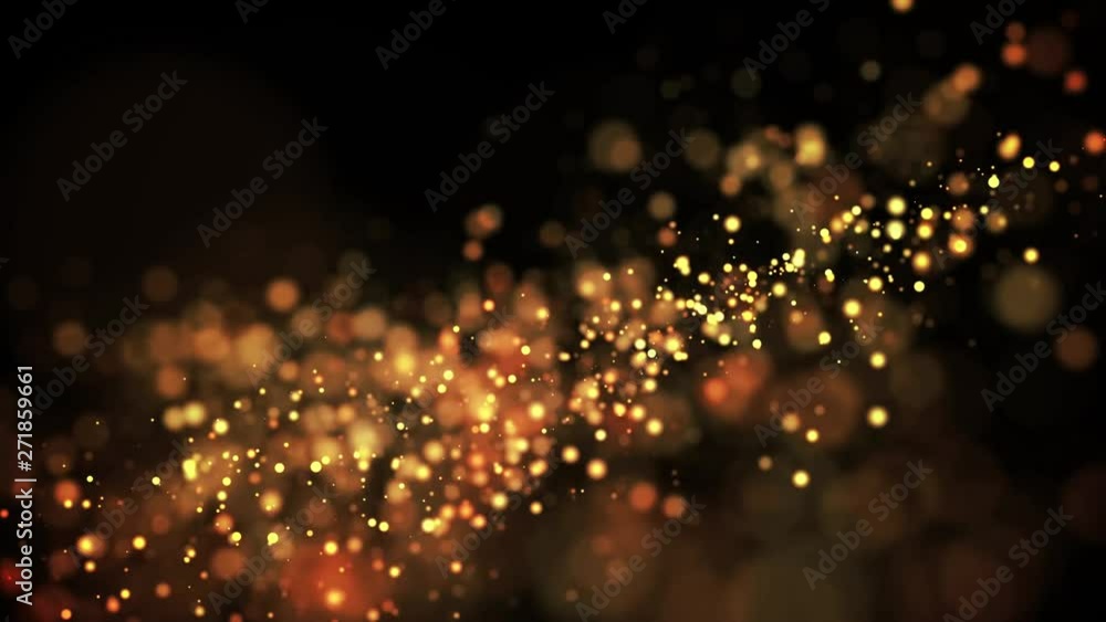 gold particles in liquid float and glisten. Background with glittering ...