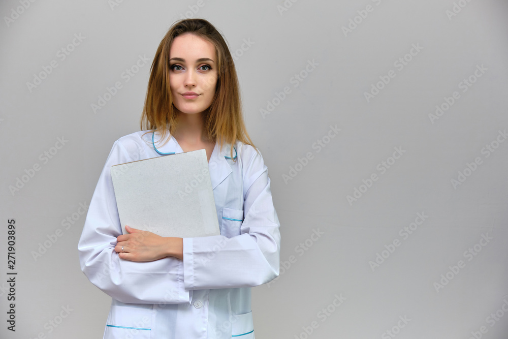 Fotka „Photograph of a portrait of a beautiful girl doctor woman with ...