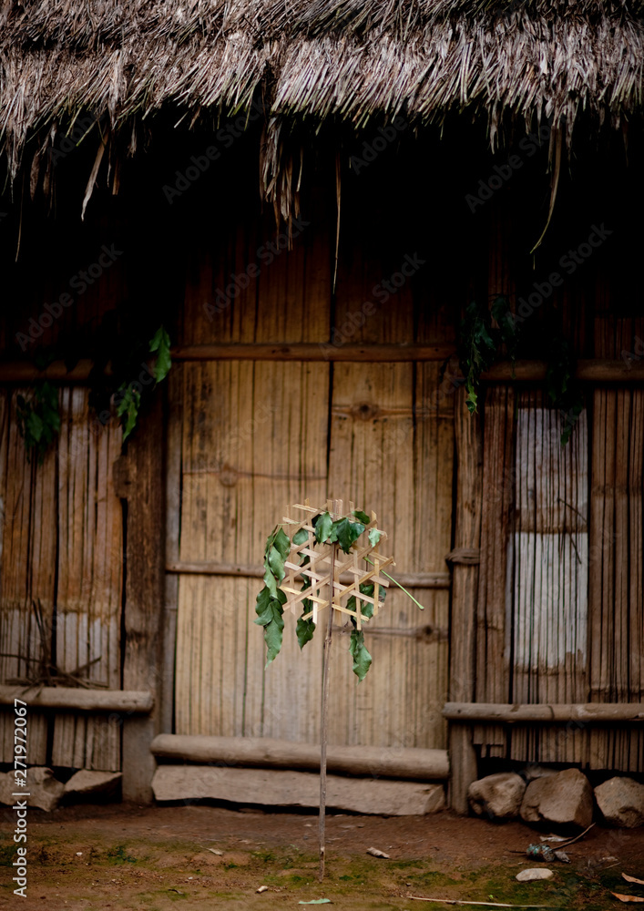 Hmong house with shaman warning sign, Muang sing, Laos 스톡 사진 | Adobe Stock
