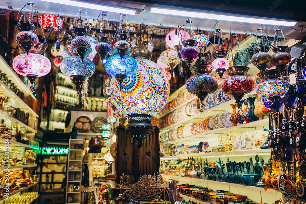 Shopping at the Grand Bazaar. Traditional Turkish lamps in the souvenir ...