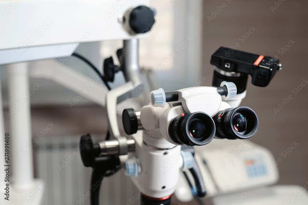 Dental binocular microscope on the background of modern dentistry ...