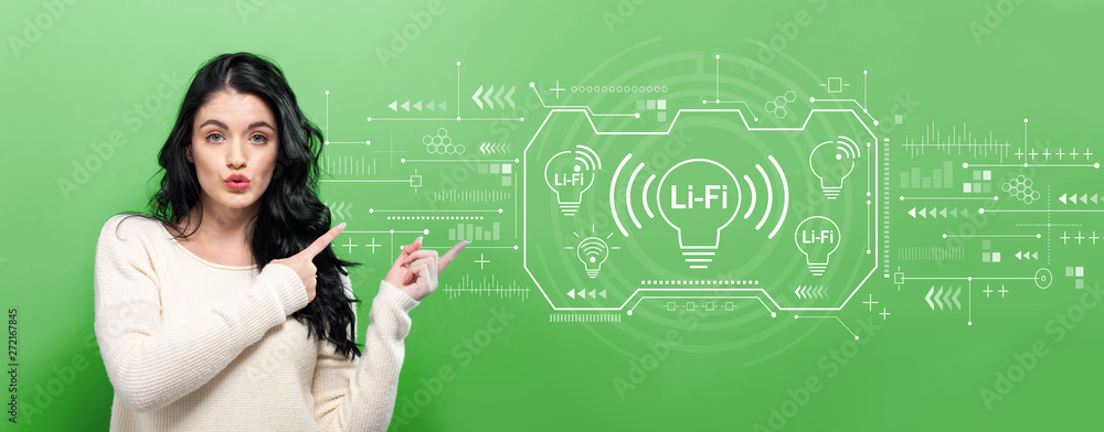 LiFi theme with young woman pointing on a green background Stock Photo ...