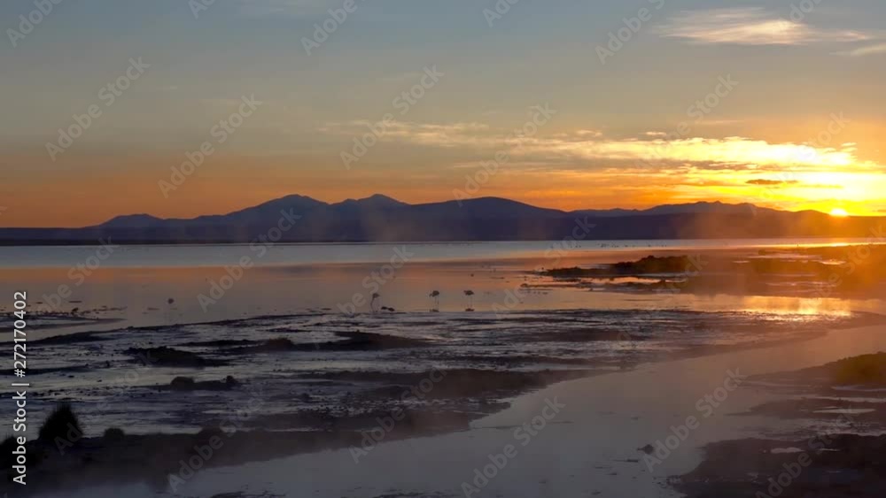 Zoom Out of Misty, steaming thermal pools at Laguna Colorada near ...