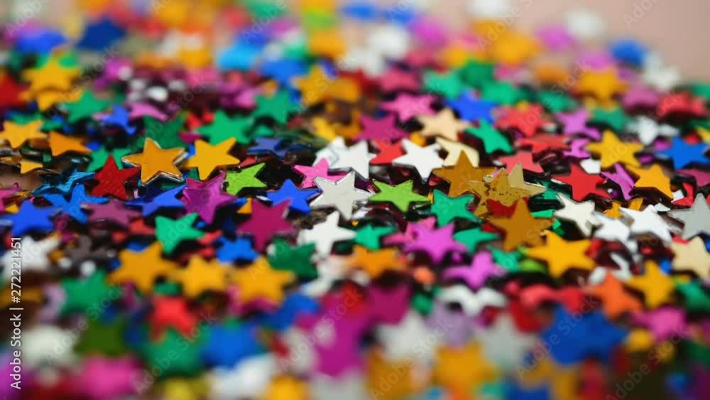 close up star glitter shape , mixed color , pray or hope sign or ...