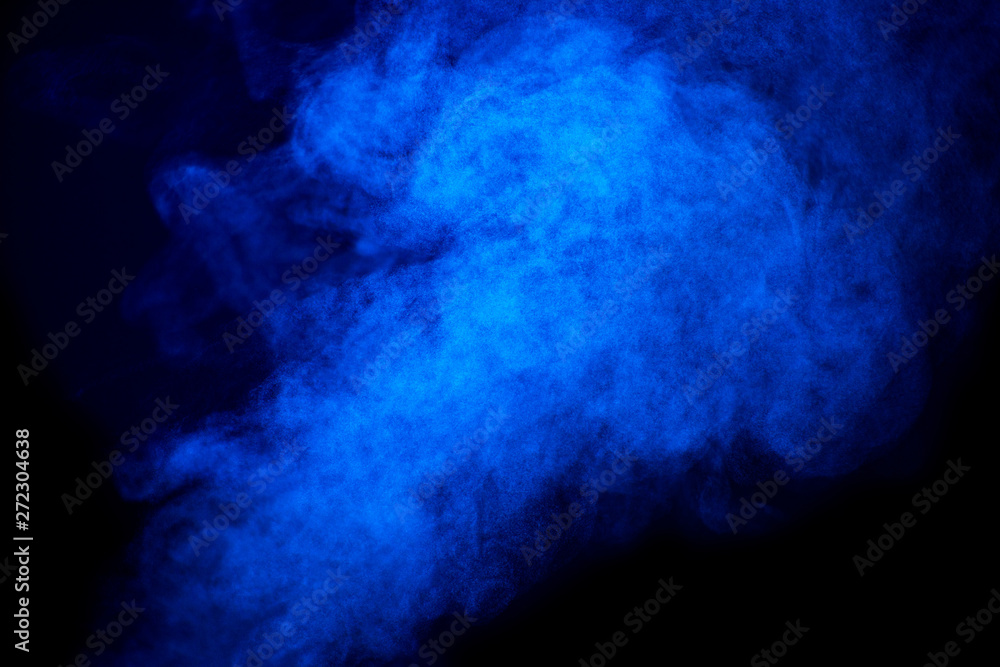 Bright blue smoke isolated on black background Stock Photo | Adobe Stock