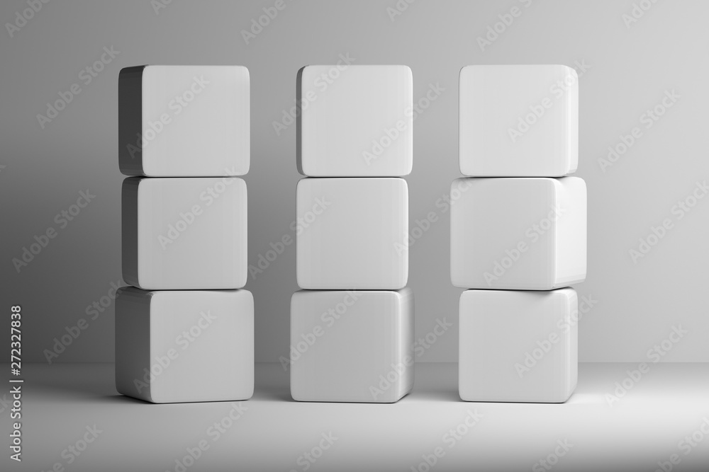 Set of nine white cubes with rounded edges stacked on each other on ...