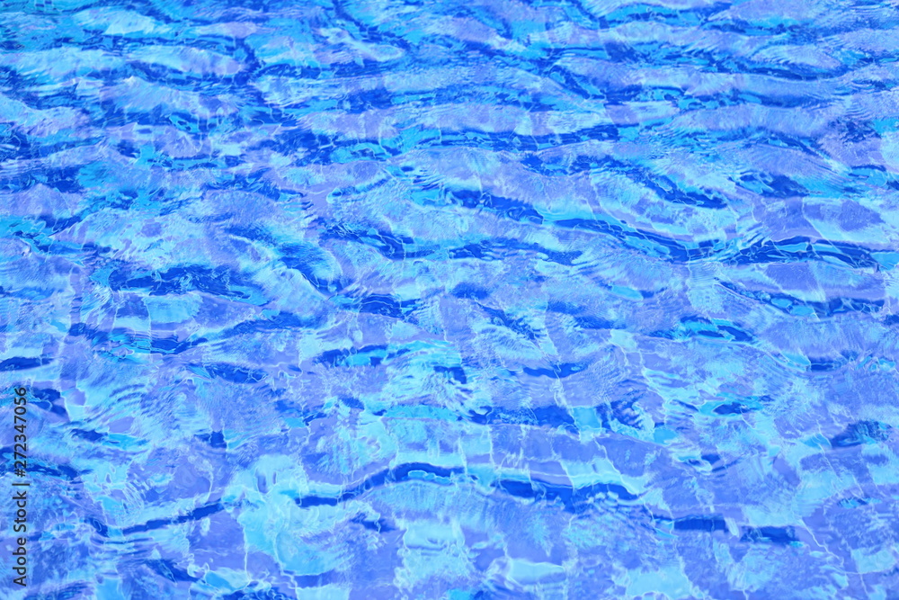 wave of swimming pool water surface. open water body blown by strong ...