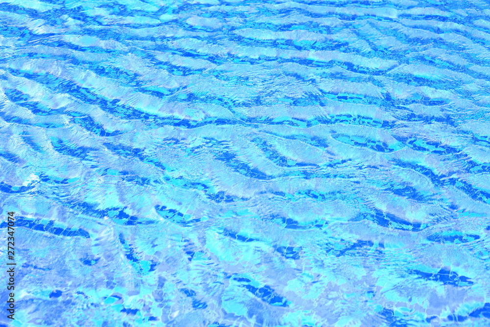 wave of swimming pool water surface. open water body blown by strong ...