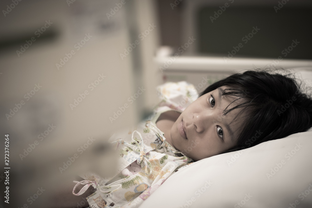Asian kid patient child girl inpatient sad look at IV infusion drop for ...