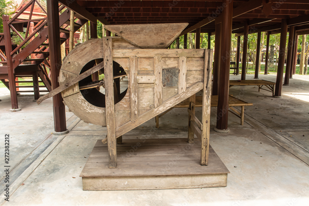 Ancient rice milling machine used for changing the paddy into rice. In ...