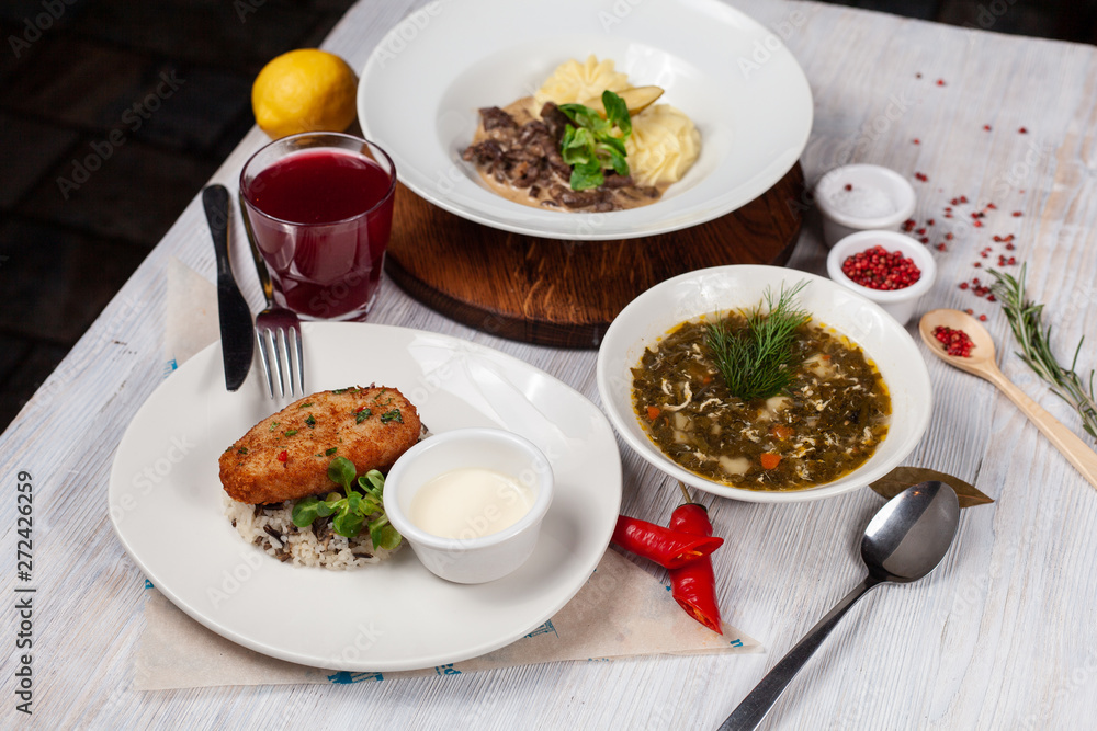 Fotografia do Stock: Top view of a three course set menu: beef ...