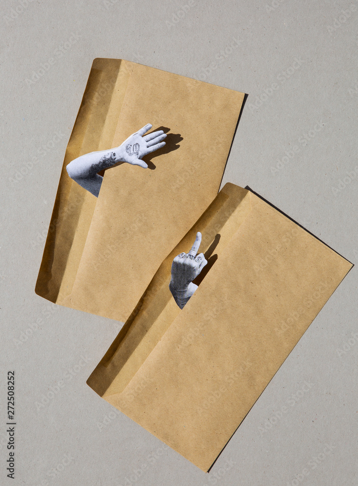 Collage of two hands giving gestures emerging from two brown envelopes ...
