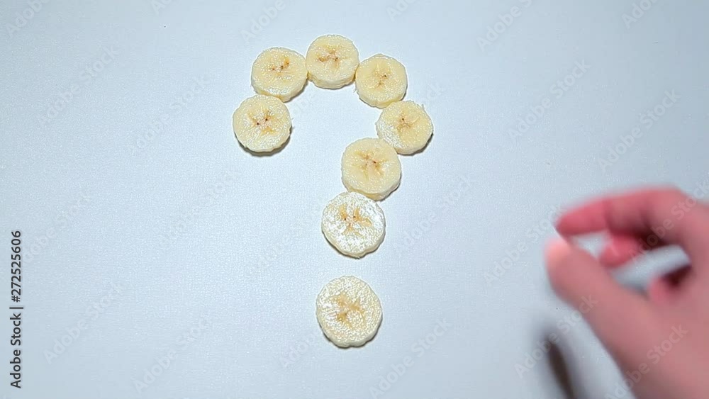 Vidéo Stock banana question mark hand white background hd footage ...