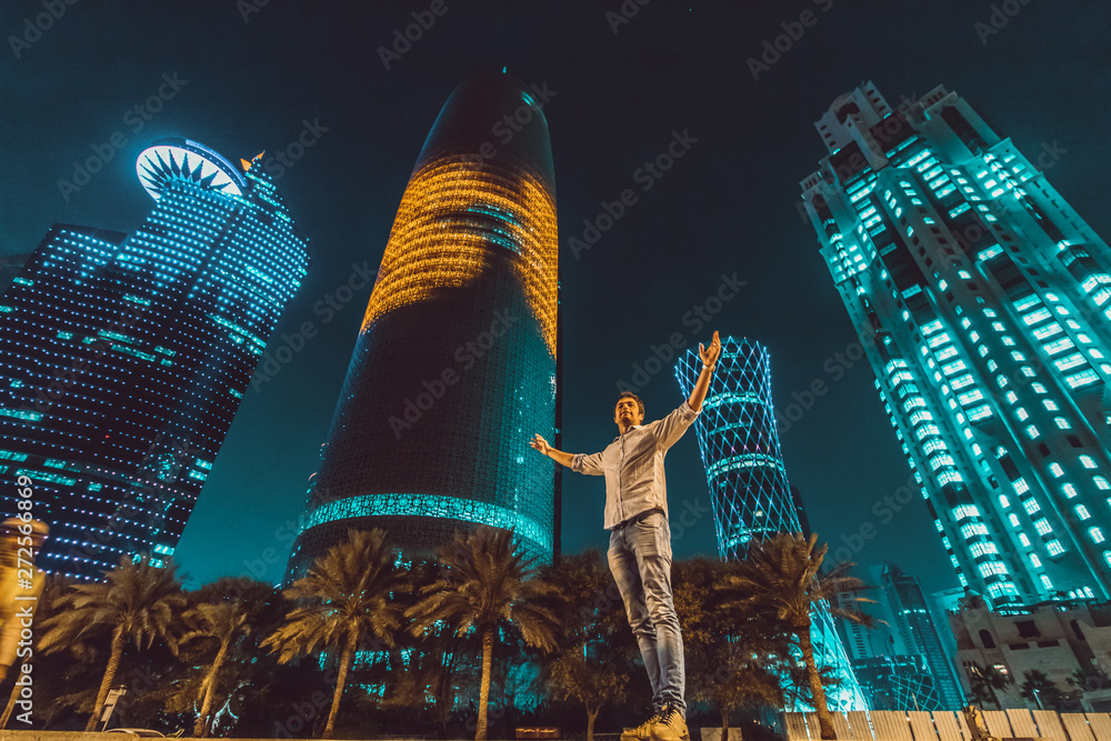 Caucasian man in front of Doha Skysrapers, in Qatar Stock Photo | Adobe ...