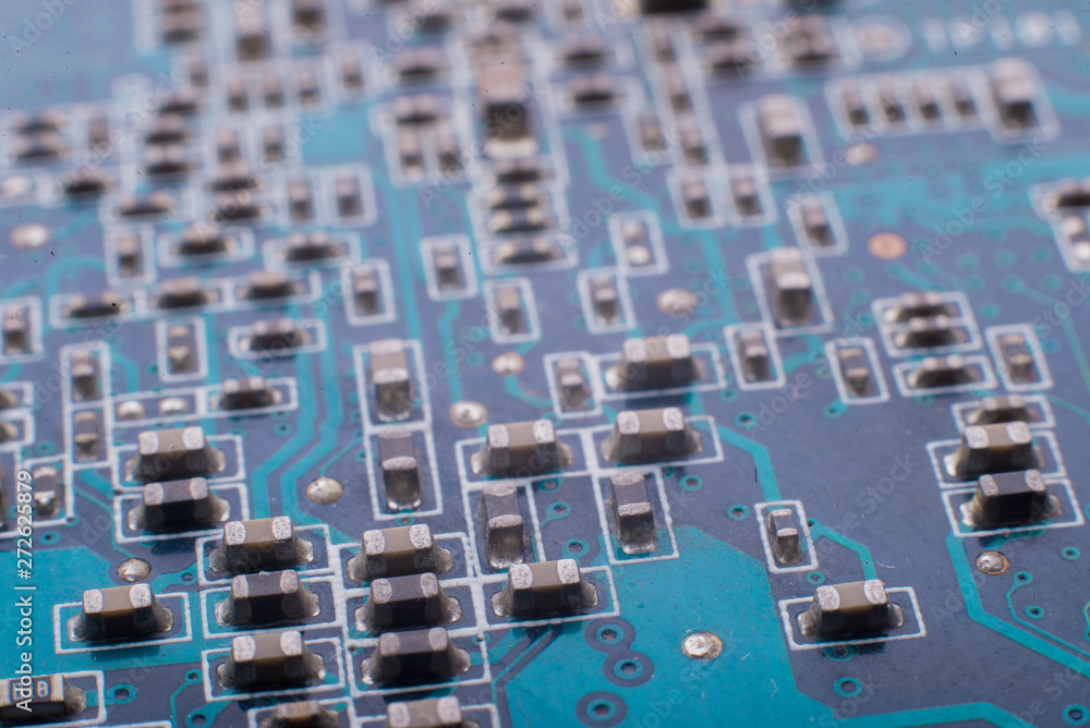 Chips and capacitors on the board Stock Photo | Adobe Stock