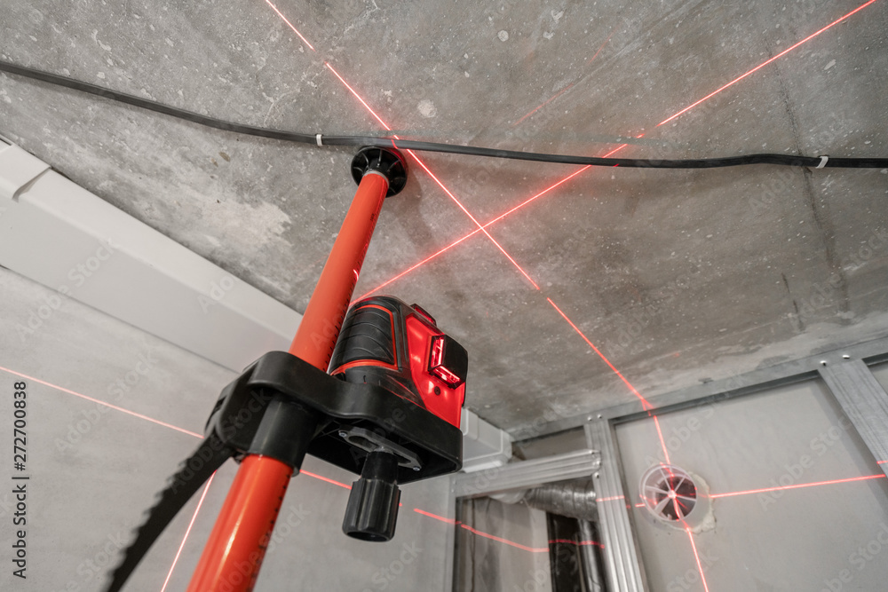 Laser measurement during renovation. Construction tools and equipment ...