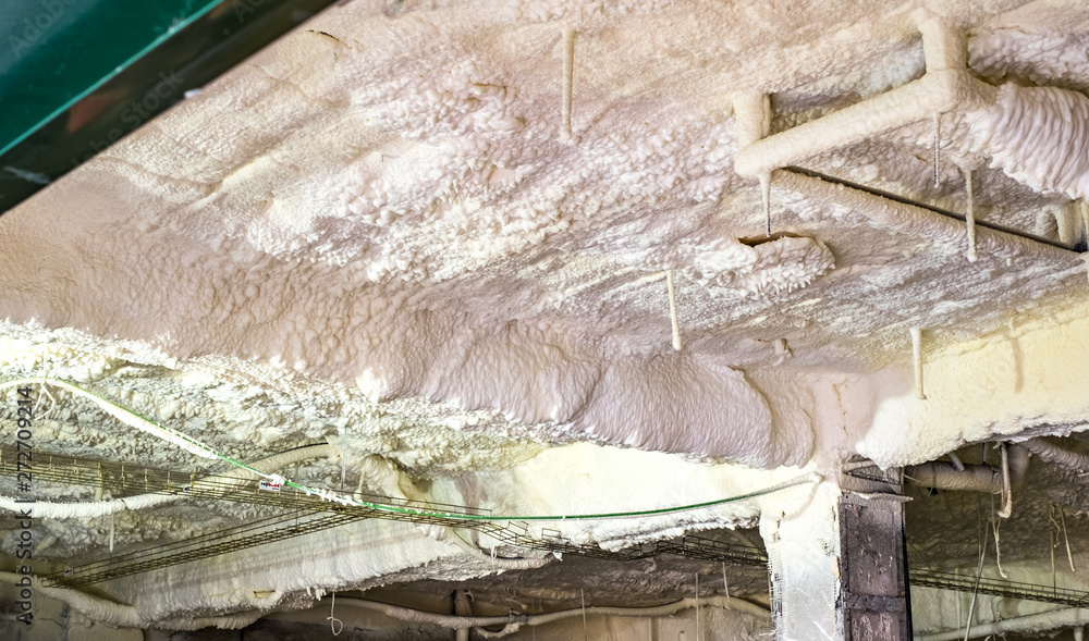 thermal insulation with foam on the ceiling Stock Photo | Adobe Stock