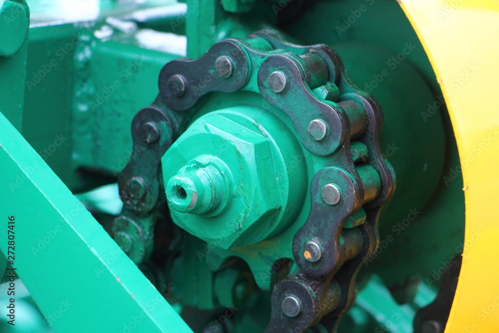 Sprocket with chain close-up, chain drive in the transmission of heavy ...
