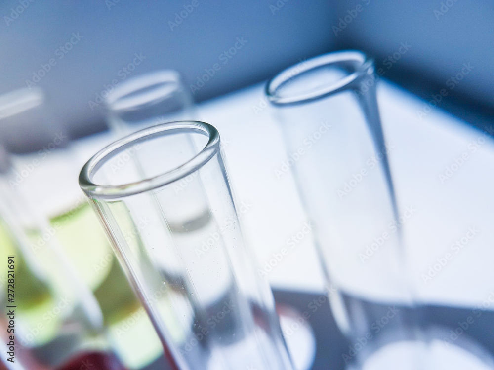 Multiple test tubes packed with chemicals, close-ups, background Stock ...