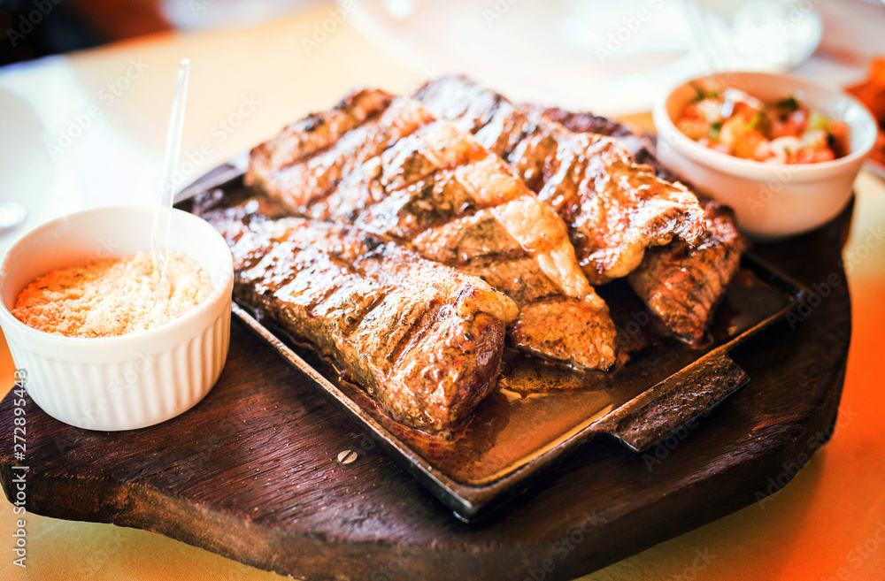 Grilled Picanha, traditional Brazilian beef cut. Meat served on the ...