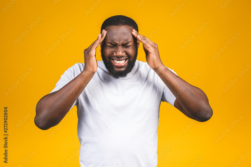 Stressed young african american man feel pain having terrible strong ...