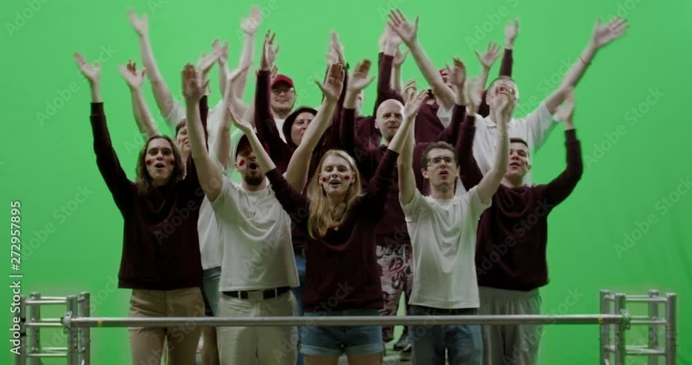 GREEN SCREEN CHROMA KEY Front view group of people fans wearing red ...