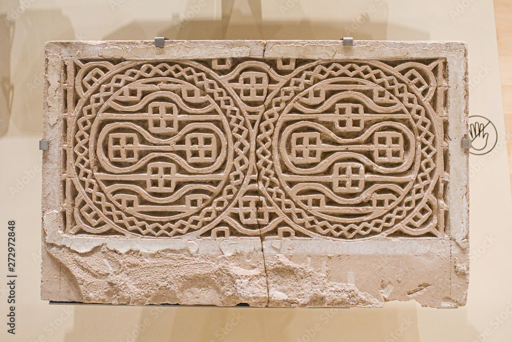 The sample of ancient carved stone used in bedouin architecture in ...