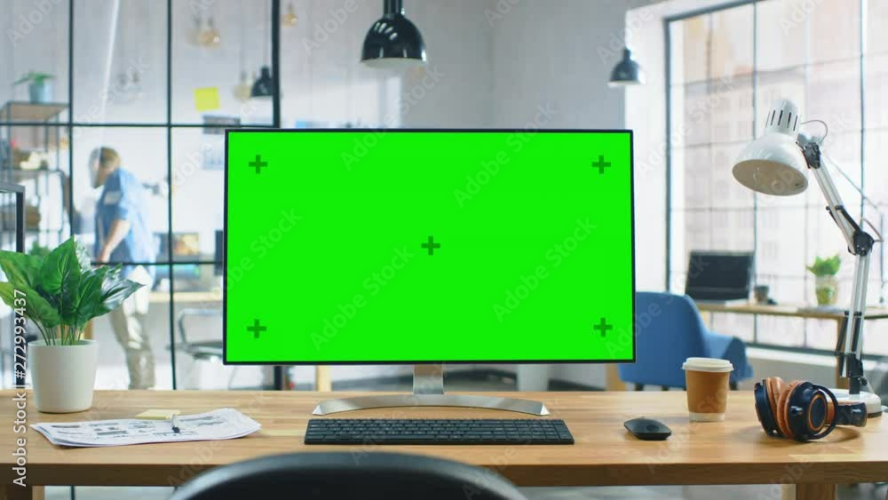 Wide Green Mock-up Screen Desktop Computer Standing on the Desk in the ...