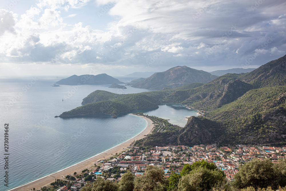 Oludeniz is a resort village on the southwest coast of Turkey. It’s ...