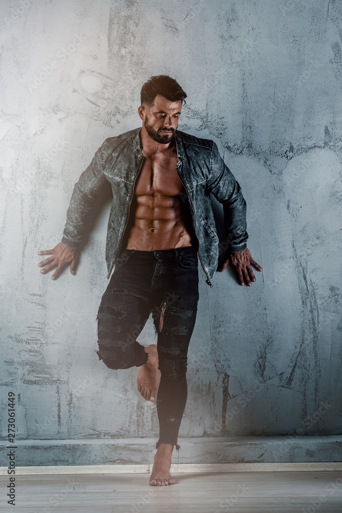 Muscular Men in Jeans Wearing Jacket But Exposing his Muscular Torso ...