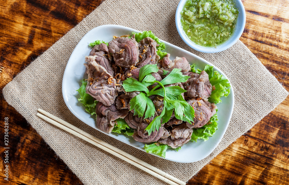Instant - Boiled Beef dip with hot in white dish and sour sauce in Thai ...