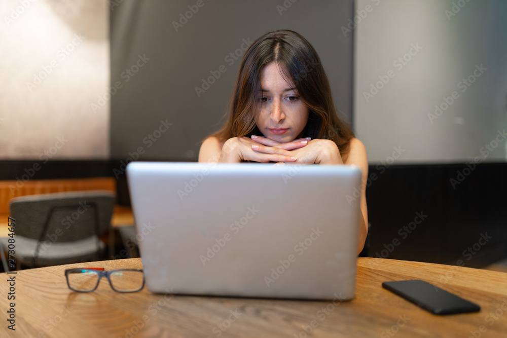 Business woman work process concept. Shocked female freelancer stares ...