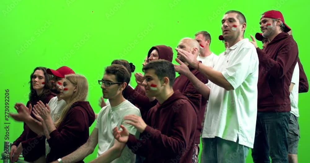 GREEN SCREEN CHROMA KEY 3/4 view group of people fans wearing red ...