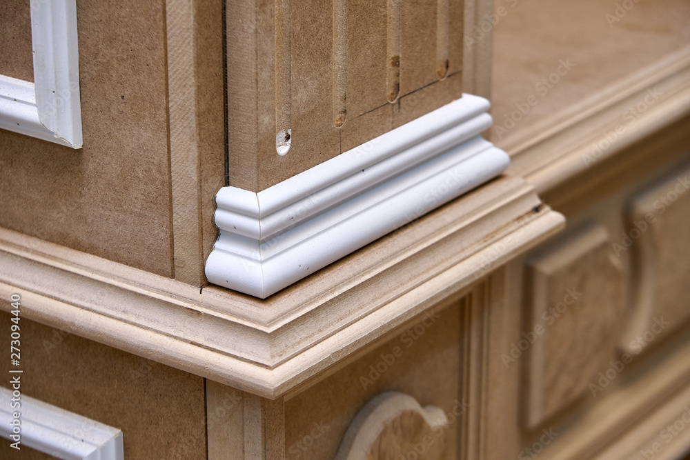 Mdf cabinet carcass with moldings and wooden carved capital. Wooden ...