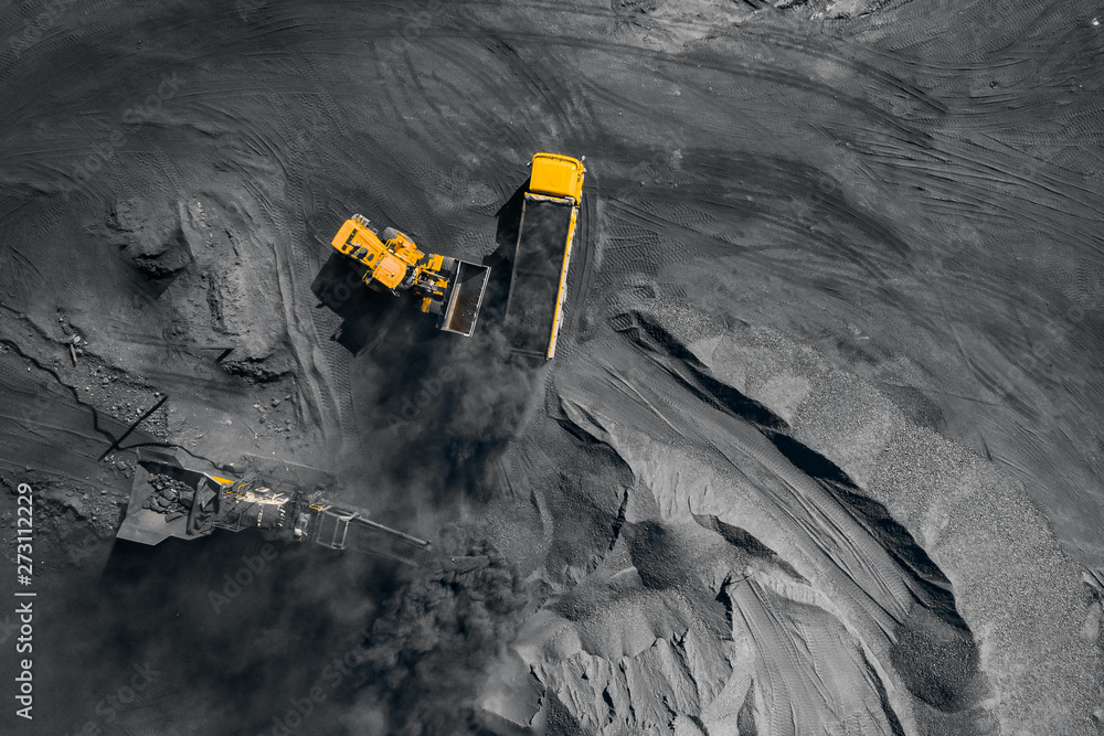 Open pit mine, coal loading in trucks, transportation and logistics ...