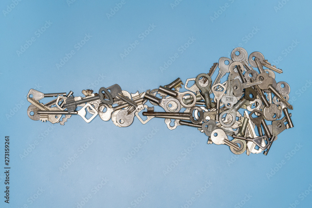 Bunch of keys in shape of big key concept. Different antique and new ...