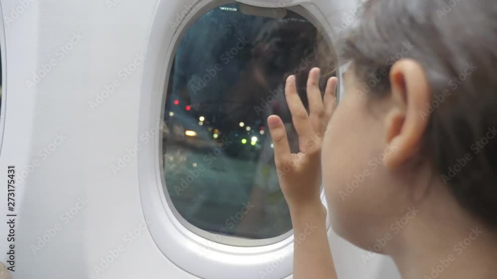 teen girl says goodbye lifestyle waving his hand at the window of the ...