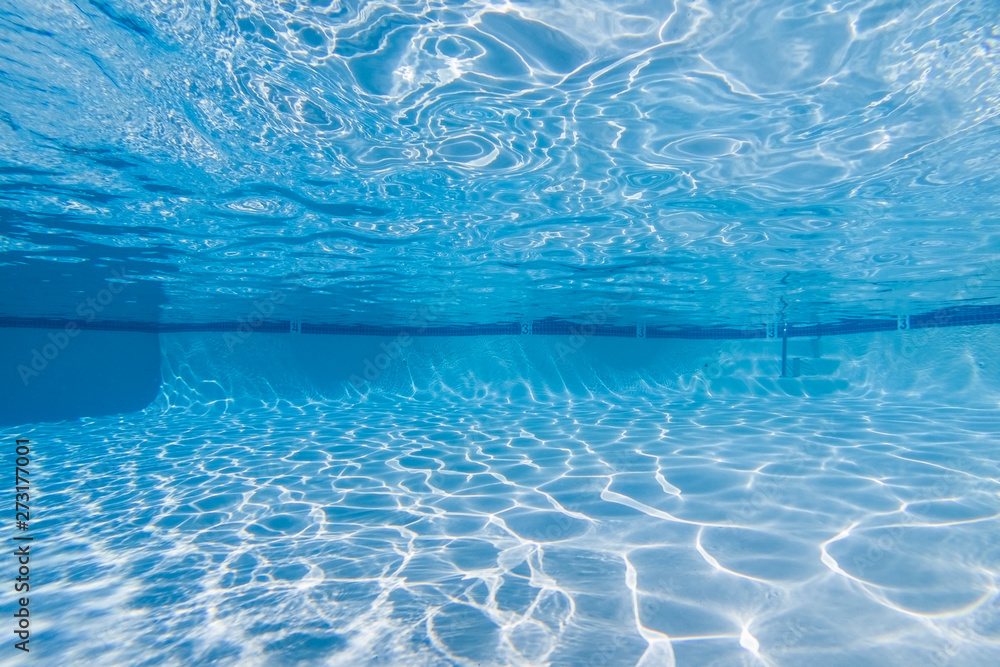 Underwater sunlight patterns in empty suburban swimming pool. Stock ...