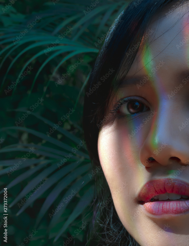 Half close up portrait of an Asian woman looking at camera with lines ...