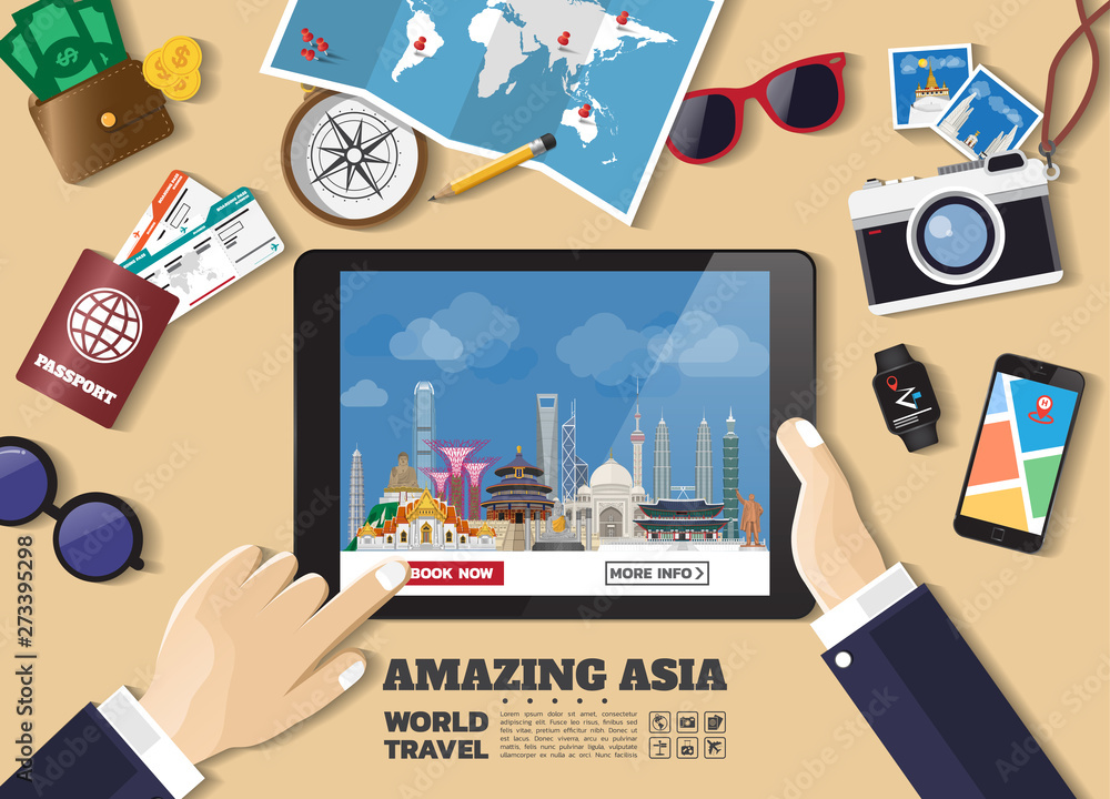 Hand holding smart tablet booking travel destination.Asia famous places ...
