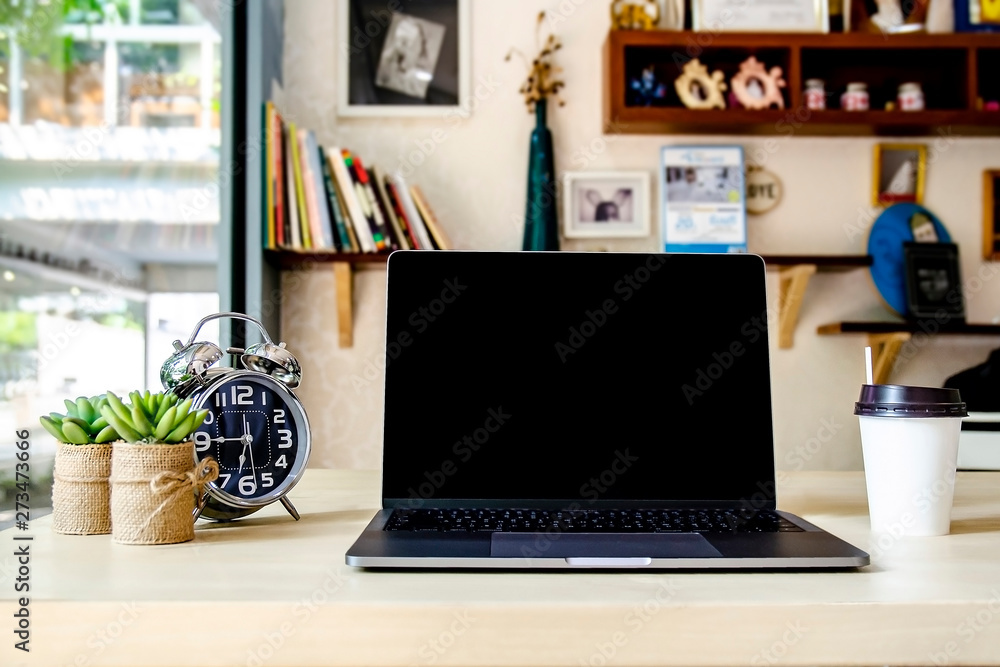 Blank working desk in home office with equipment such as laptop ...