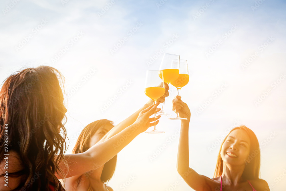 Beautiful girl group wearing bikini, partying and swimming at the sea ...