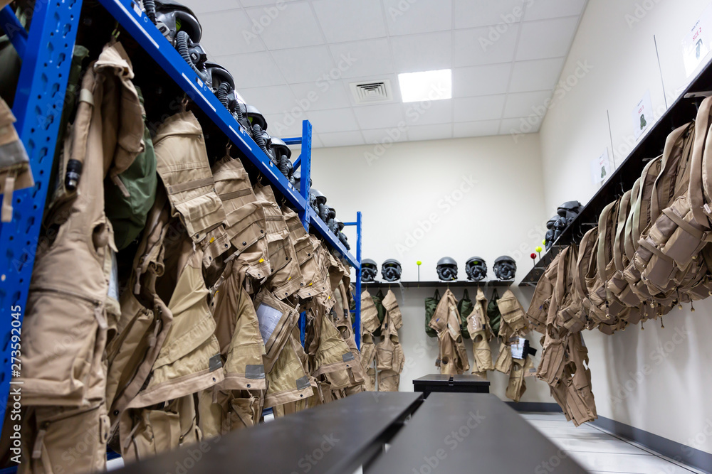 Fighter aircraft pilot uniforms dressing room Stock Photo | Adobe Stock