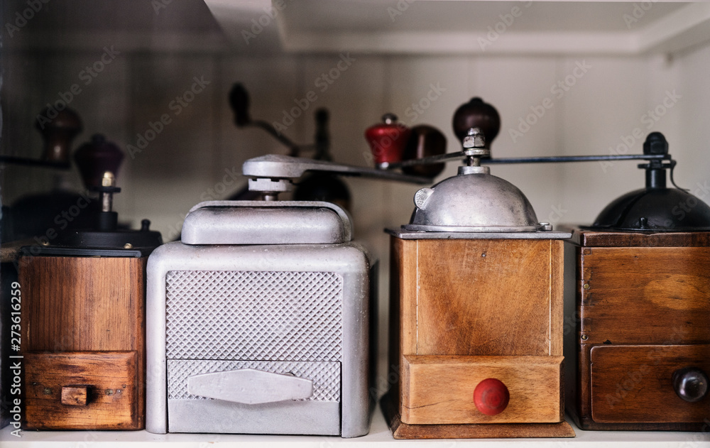 Old fashioned items on wooden shelf. Colorful of ancient collection in ...