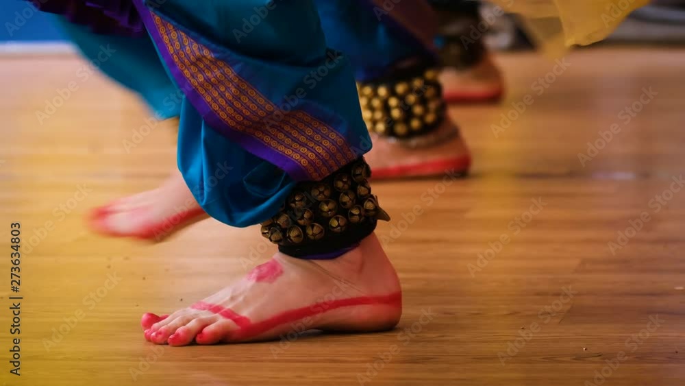 Indian dance. women's feet in Indian national dress dancing on stage ...